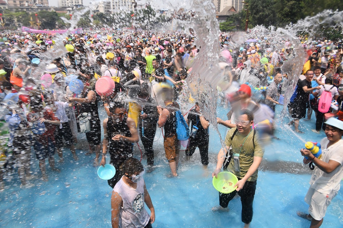 Water-splashing festivals boost tourism in China, Southeast Asia ...